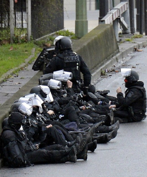 HOSTAGES: Charlie Hebdo killers and accomplice carry out two separate ...