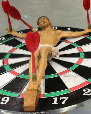 Sickening portrayal of Jesus pinned to a dartboard presented as art in ...